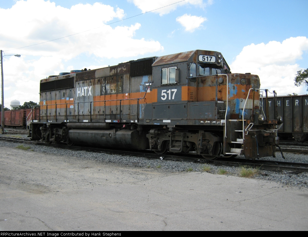 HATX 517 shows its old B&M blue under patched ad worn Guilford colors. This unit has been with ...